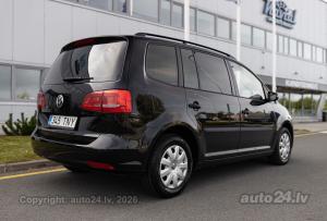 Black Volkswagen Touran 2011 in Tallinn, with an engine capacity of 1.60 L and mileage of 351 thousand km for 4999 €, photo 5 on AUTOMOTO.COM.LV