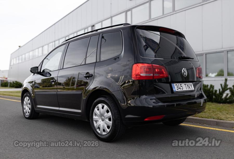 Black Volkswagen Touran 2011 in Tallinn, with an engine capacity of 1.60 L and mileage of 351 thousand km for 4999 €, photo 6 on AUTOMOTO.COM.LV