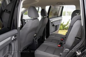 Black Volkswagen Touran 2011 in Tallinn, with an engine capacity of 1.60 L and mileage of 351 thousand km for 4999 €, photo 10 on AUTOMOTO.COM.LV