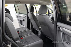 Black Volkswagen Touran 2011 in Tallinn, with an engine capacity of 1.60 L and mileage of 351 thousand km for 4999 €, photo 20 on AUTOMOTO.COM.LV