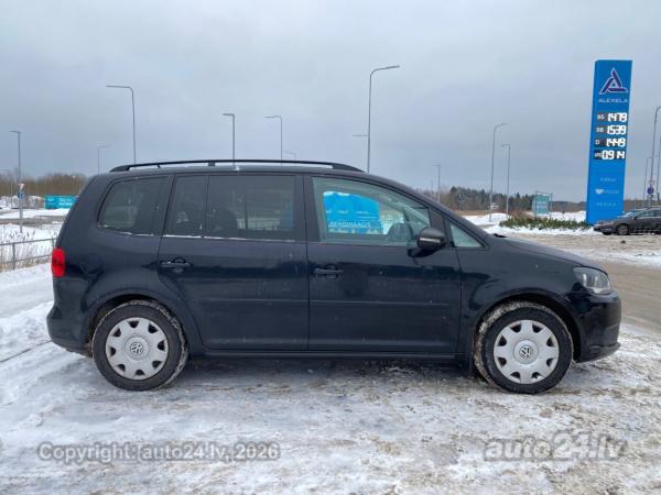 Melns Volkswagen Touran 2012 Tallina, ar dzinēja tilpumu 1.40 L un nobraukumu 466 tūkst. km par 4300 €, foto 3 vietnē AUTOMOTO.COM.LV