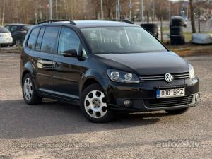 Melns Volkswagen Touran 2012 Tartu, ar dzinēja tilpumu 1.60 L un nobraukumu 281 tūkst. km par 4990 €, foto  vietnē AUTOMOTO.COM.LV