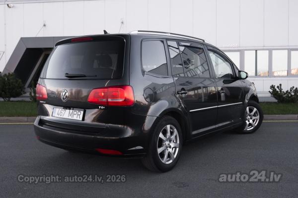 Melns Volkswagen Touran 2012 Tallina, ar dzinēja tilpumu 1.60 L un nobraukumu 295 tūkst. km par 4300 €, foto 5 vietnē AUTOMOTO.COM.LV