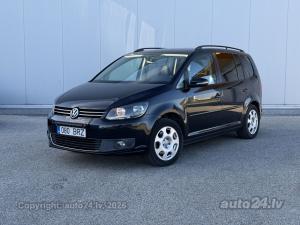 Melns Volkswagen Touran 2012 Tartu, ar dzinēja tilpumu 1.60 L un nobraukumu 281 tūkst. km par 4990 €, foto  vietnē AUTOMOTO.COM.LV