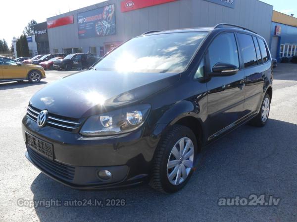 Black Volkswagen Touran 2013 in Viljandi, with an engine capacity of 2.00 L and mileage of 193 thousand km for 7990 €, photo 1 on AUTOMOTO.COM.LV