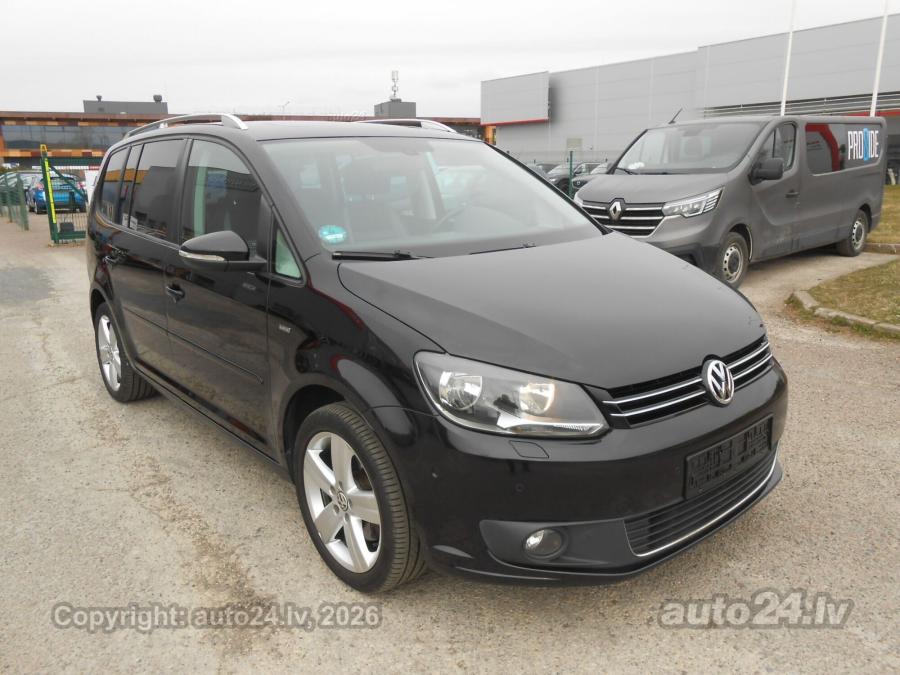 Black Volkswagen Touran 2014 in Viljandi, with an engine capacity of 2.00 L and mileage of 212 thousand km for 8990 €, photo 4 on AUTOMOTO.COM.LV