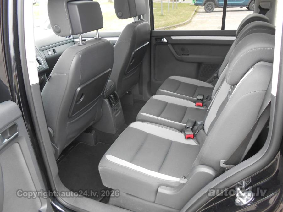 Black Volkswagen Touran 2014 in Viljandi, with an engine capacity of 2.00 L and mileage of 212 thousand km for 8990 €, photo 10 on AUTOMOTO.COM.LV