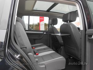 Black Volkswagen Touran 2014 in Viljandi, with an engine capacity of 2.00 L and mileage of 212 thousand km for 8990 €, photo 14 on AUTOMOTO.COM.LV