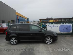 Black Volkswagen Touran 2014 in Viljandi, with an engine capacity of 2.00 L and mileage of 212 thousand km for 8990 €, photo 21 on AUTOMOTO.COM.LV