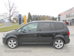 Black Volkswagen Touran 2014 in Viljandi, with an engine capacity of 2.00 L and mileage of 212 thousand km for 8990 €, photo 22 on AUTOMOTO.COM.LV
