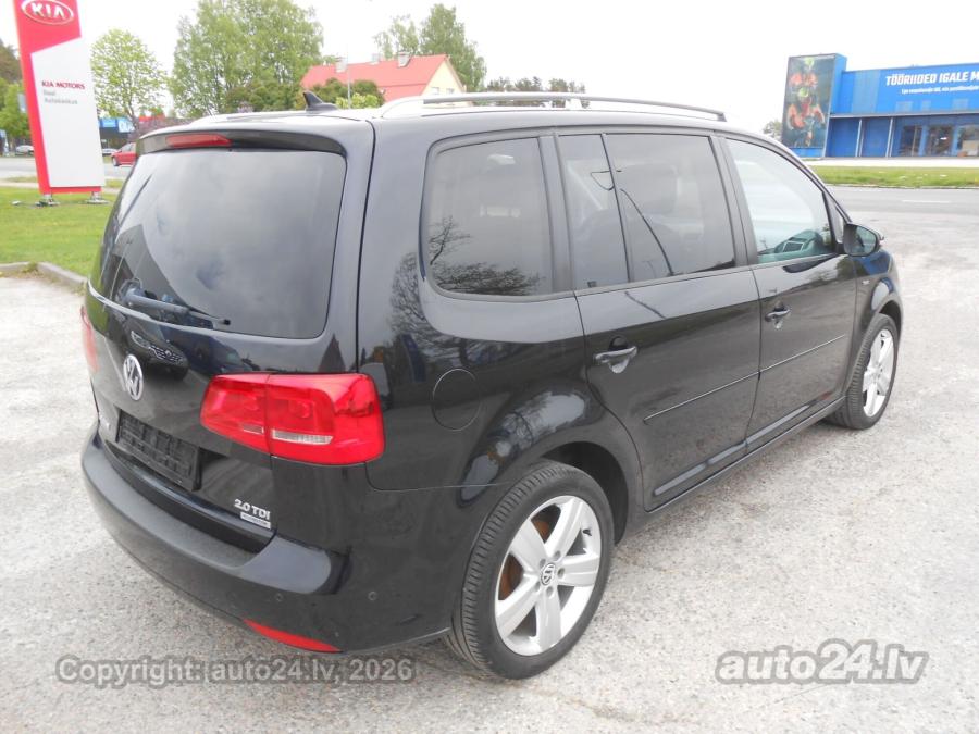 Melns Volkswagen Touran 2014 Viljandi, ar dzinēja tilpumu 2.00 L un nobraukumu 212 tūkst. km par 8990 €, foto 3 vietnē AUTOMOTO.COM.LV