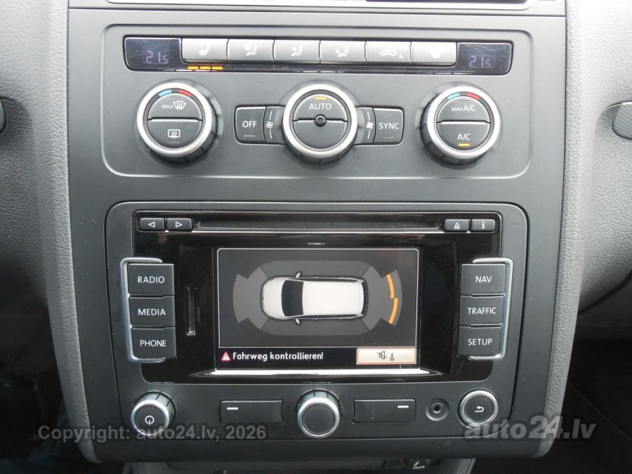 Melns Volkswagen Touran 2014 Viljandi, ar dzinēja tilpumu 2.00 L un nobraukumu 212 tūkst. km par 8990 €, foto 7 vietnē AUTOMOTO.COM.LV
