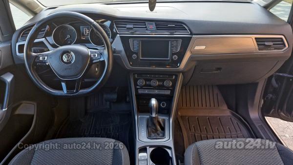Black Volkswagen Touran 2016 in Jelgava, with an engine capacity of 1.60 L and mileage of 216 thousand km for 9600 €, photo 9 on AUTOMOTO.COM.LV