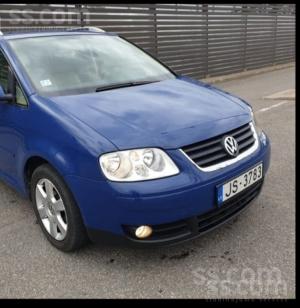 Zils Volkswagen Touran 2004 Rīga, ar dzinēja tilpumu 2.00 L un nobraukumu 400 tūkst. km par 500 €, foto  vietnē AUTOMOTO.COM.LV