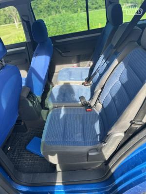 Blue Volkswagen Touran 2004 in Panevezys, with an engine capacity of 2.00 L and mileage of 254 thousand km for 2250 €, photo 6 on AUTOMOTO.COM.LV