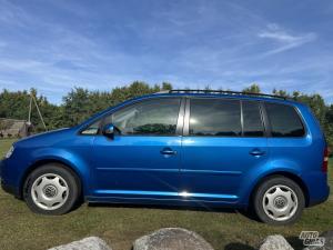Blue Volkswagen Touran 2004 in Panevezys, with an engine capacity of 2.00 L and mileage of 254 thousand km for 2250 €, photo 9 on AUTOMOTO.COM.LV