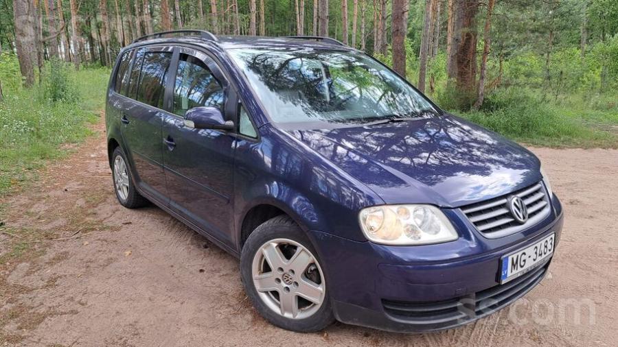 Zils Volkswagen Touran 2005 Daugavpils, ar dzinēja tilpumu 1.90 L un nobraukumu 367 tūkst. km par 1500 €, foto 1 vietnē AUTOMOTO.COM.LV