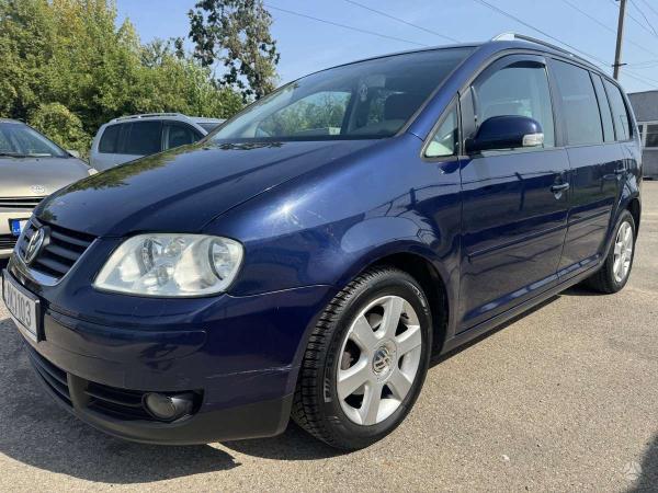 Blue Volkswagen Touran 2005 in Kaunas, with an engine capacity of 2.00 L and mileage of 380 thousand km for 2100 €, photo 2 on AUTOMOTO.COM.LV