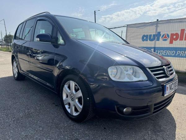 Blue Volkswagen Touran 2005 in Kaunas, with an engine capacity of 2.00 L and mileage of 380 thousand km for 2100 €, photo 8 on AUTOMOTO.COM.LV