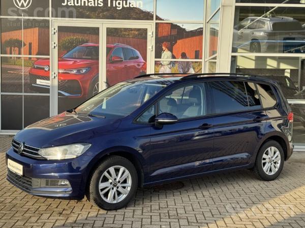 Blue Volkswagen Touran 2021 in Valmiera, with an engine capacity of 2.00 L and mileage of 185 thousand km for 17500 €, photo 3 on AUTOMOTO.COM.LV