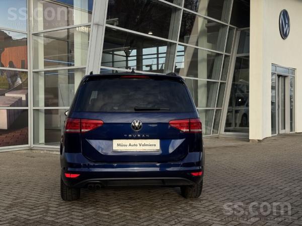 Blue Volkswagen Touran 2021 in Valmiera, with an engine capacity of 2.00 L and mileage of 185 thousand km for 17500 €, photo 5 on AUTOMOTO.COM.LV