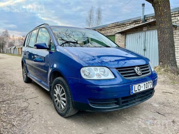 Blue Volkswagen Touran 2003 in Riga, with an engine capacity of 1.60 L and mileage of 230 thousand km for 6400 €, photo 5 on AUTOMOTO.COM.LV