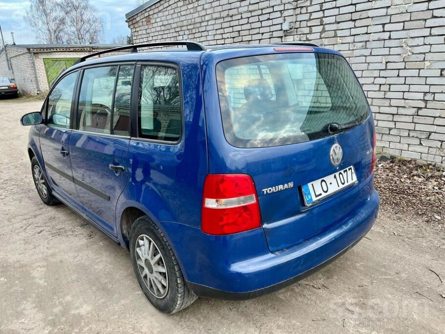 Blue Volkswagen Touran 2003 in Riga, with an engine capacity of 1.60 L and mileage of 230 thousand km for 6400 €, photo 6 on AUTOMOTO.COM.LV