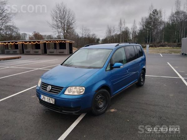 Zils Volkswagen Touran 2003 Aizkraukle, ar dzinēja tilpumu 1.90 L un nobraukumu 315 tūkst. km par 1600 €, foto 1 vietnē AUTOMOTO.COM.LV