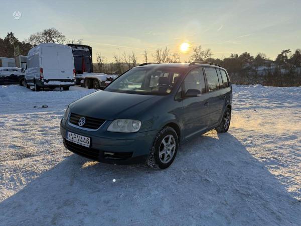 Blue Volkswagen Touran 2003 in Utena, with an engine capacity of 1.90 L and mileage of 395 thousand km for 1450 €, photo 1 on AUTOMOTO.COM.LV