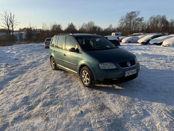 Blue Volkswagen Touran 2003 in Utena, with an engine capacity of 1.90 L and mileage of 395 thousand km for 1450 €, photo 3 on AUTOMOTO.COM.LV