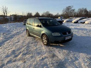Blue Volkswagen Touran 2003 in Utena, with an engine capacity of 1.90 L and mileage of 395 thousand km for 1450 €, photo 3 on AUTOMOTO.COM.LV
