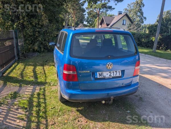 Zils Volkswagen Touran 2003 Jūrmala, ar dzinēja tilpumu 1.60 L un nobraukumu 271 tūkst. km par 1350 €, foto 1 vietnē AUTOMOTO.COM.LV