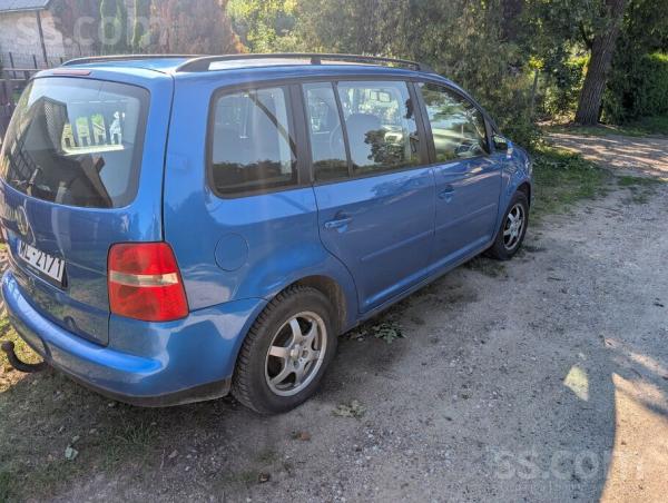 Zils Volkswagen Touran 2003 Jūrmala, ar dzinēja tilpumu 1.60 L un nobraukumu 271 tūkst. km par 1350 €, foto 8 vietnē AUTOMOTO.COM.LV