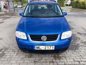 Zils Volkswagen Touran 2003 Rīga, ar dzinēja tilpumu 1.60 L un nobraukumu 271 tūkst. km par 963 €, foto  vietnē AUTOMOTO.COM.LV