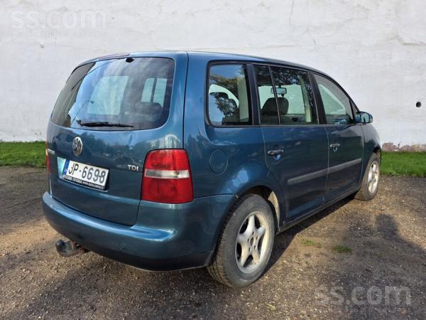 Blue Volkswagen Touran 2003 in Jelgava, with an engine capacity of 1.90 L and mileage of 0 thousand km for 1490 €, photo 4 on AUTOMOTO.COM.LV