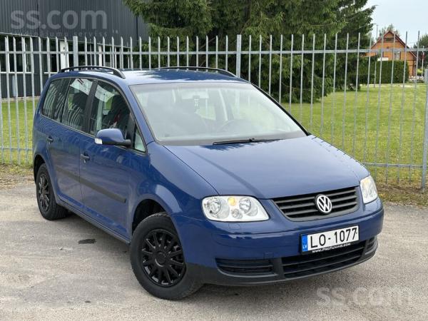 Zils Volkswagen Touran 2004 Jelgava, ar dzinēja tilpumu 1.60 L un nobraukumu 0 tūkst. km par 2700 €, foto 1 vietnē AUTOMOTO.COM.LV
