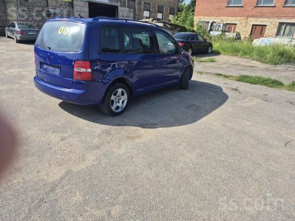 Zils Volkswagen Touran 2004 Bauska, ar dzinēja tilpumu 1.90 L un nobraukumu 600 tūkst. km par 1650 €, foto 2 vietnē AUTOMOTO.COM.LV