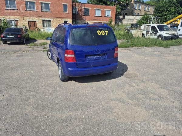 Zils Volkswagen Touran 2004 Bauska, ar dzinēja tilpumu 1.90 L un nobraukumu 600 tūkst. km par 1650 €, foto 3 vietnē AUTOMOTO.COM.LV