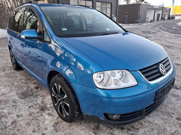Blue Volkswagen Touran 2004 in Utena, with an engine capacity of 1.90 L and mileage of 280 thousand km for 2100 €, photo 3 on AUTOMOTO.COM.LV