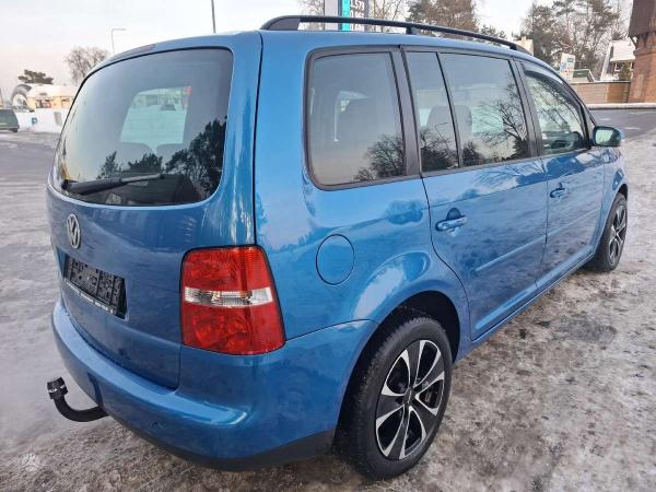 Blue Volkswagen Touran 2004 in Utena, with an engine capacity of 1.90 L and mileage of 280 thousand km for 2100 €, photo 5 on AUTOMOTO.COM.LV