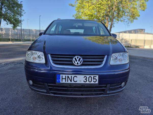 Zils Volkswagen Touran 2004 Kauņa, ar dzinēja tilpumu 2.00 L un nobraukumu 336 tūkst. km par 1550 €, foto 2 vietnē AUTOMOTO.COM.LV