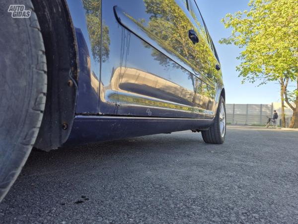 Zils Volkswagen Touran 2004 Kauņa, ar dzinēja tilpumu 2.00 L un nobraukumu 336 tūkst. km par 1550 €, foto 6 vietnē AUTOMOTO.COM.LV