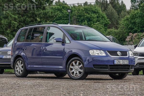 Синий Фольксваген Туран 2004 в Рига, объемом двигателя 1.90 л и пробегом 261 тыс. км за 3990 €, фото 2 на AUTOMOTO.COM.LV