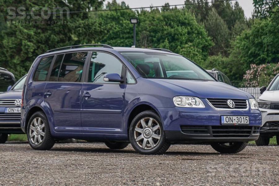 Zils Volkswagen Touran 2004 Rīga, ar dzinēja tilpumu 1.90 L un nobraukumu 261 tūkst. km par 3990 €, foto 3 vietnē AUTOMOTO.COM.LV