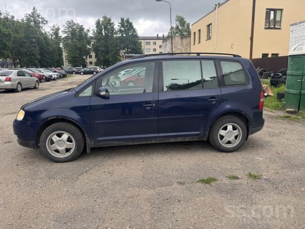 Zils Volkswagen Touran 2004 Jelgava, ar dzinēja tilpumu 1.90 L un nobraukumu 290 tūkst. km par 1690 €, foto 2 vietnē AUTOMOTO.COM.LV