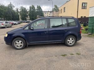 Blue Volkswagen Touran 2004 in Jelgava, with an engine capacity of 1.90 L and mileage of 290 thousand km for 1690 €, photo 3 on AUTOMOTO.COM.LV