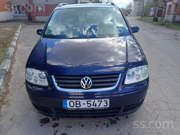 Blue Volkswagen Touran 2004 in Liepaja, with an engine capacity of 1.90 L and mileage of 183 thousand km for 2950 €, photo 3 on AUTOMOTO.COM.LV