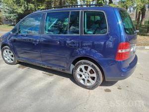 Zils Volkswagen Touran 2004 Liepāja, ar dzinēja tilpumu 1.90 L un nobraukumu 183 tūkst. km par 2950 €, foto 7 vietnē AUTOMOTO.COM.LV
