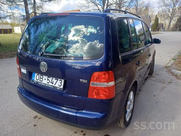 Blue Volkswagen Touran 2004 in Liepaja, with an engine capacity of 1.90 L and mileage of 183 thousand km for 2950 €, photo 7 on AUTOMOTO.COM.LV