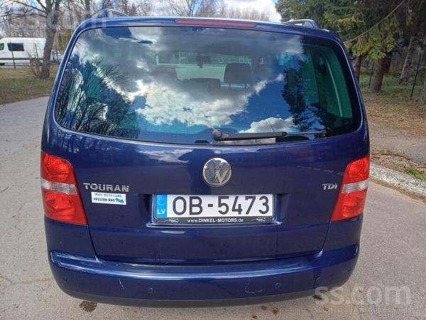 Blue Volkswagen Touran 2004 in Liepaja, with an engine capacity of 1.90 L and mileage of 183 thousand km for 2950 €, photo 8 on AUTOMOTO.COM.LV